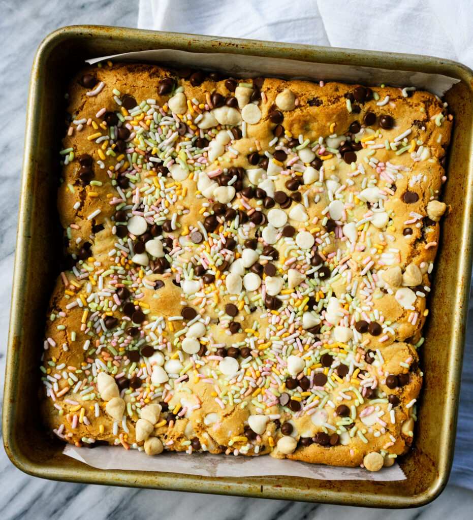 Loaded Birthday Cake Cookie Bars - Mad About Food